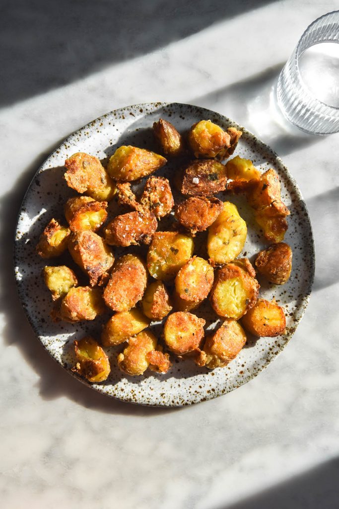 Roasted kipfler potatoes with parmesan herb crust - George Eats